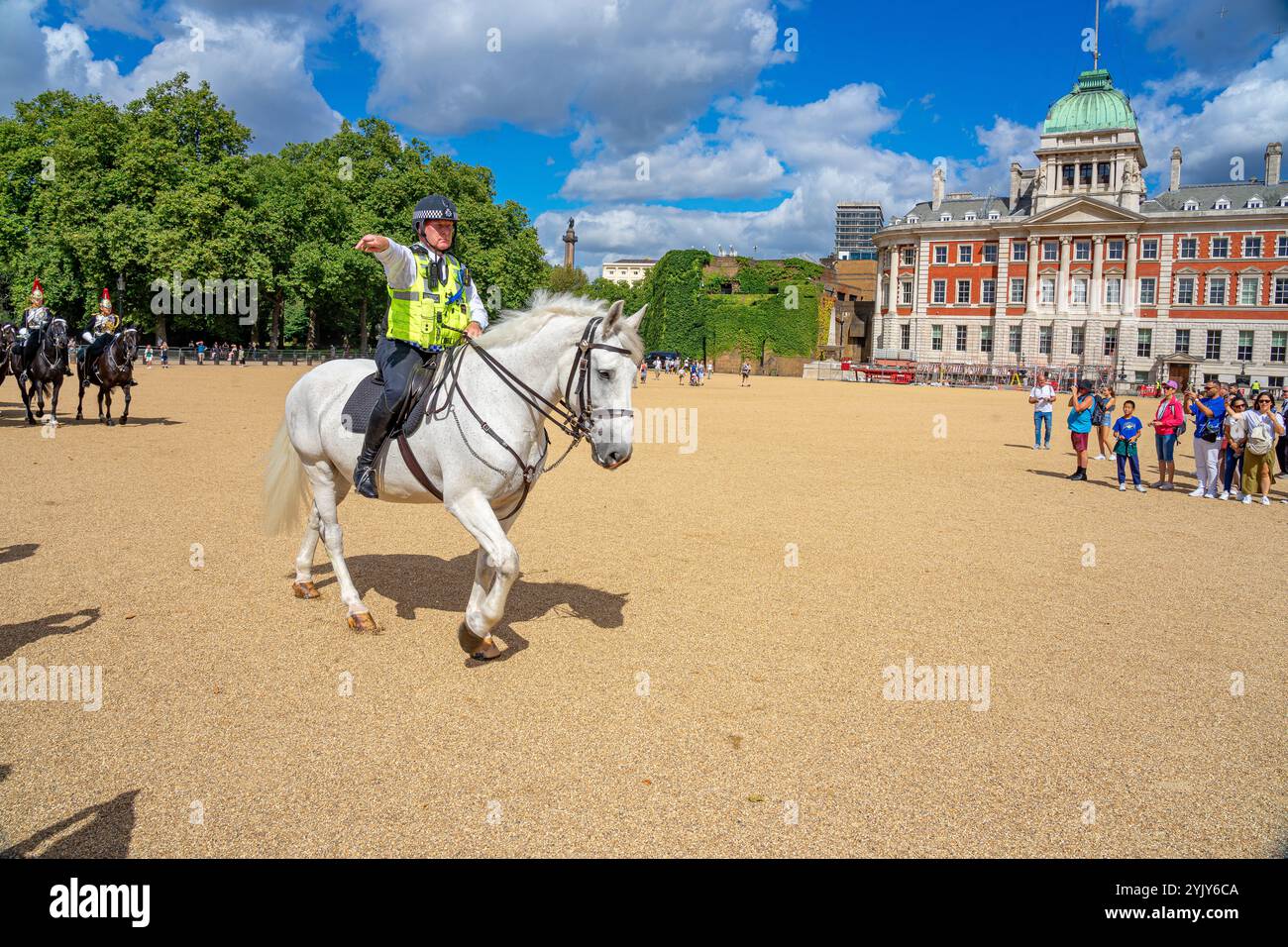 facade of the horse guards parade building with countless horses ...