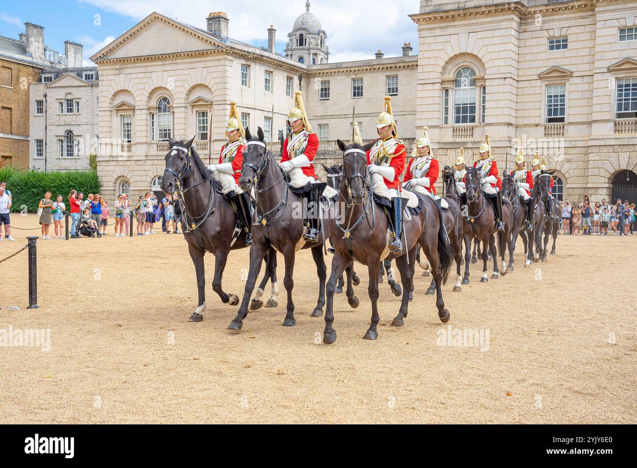 facade of the horse guards parade building with countless horses ...