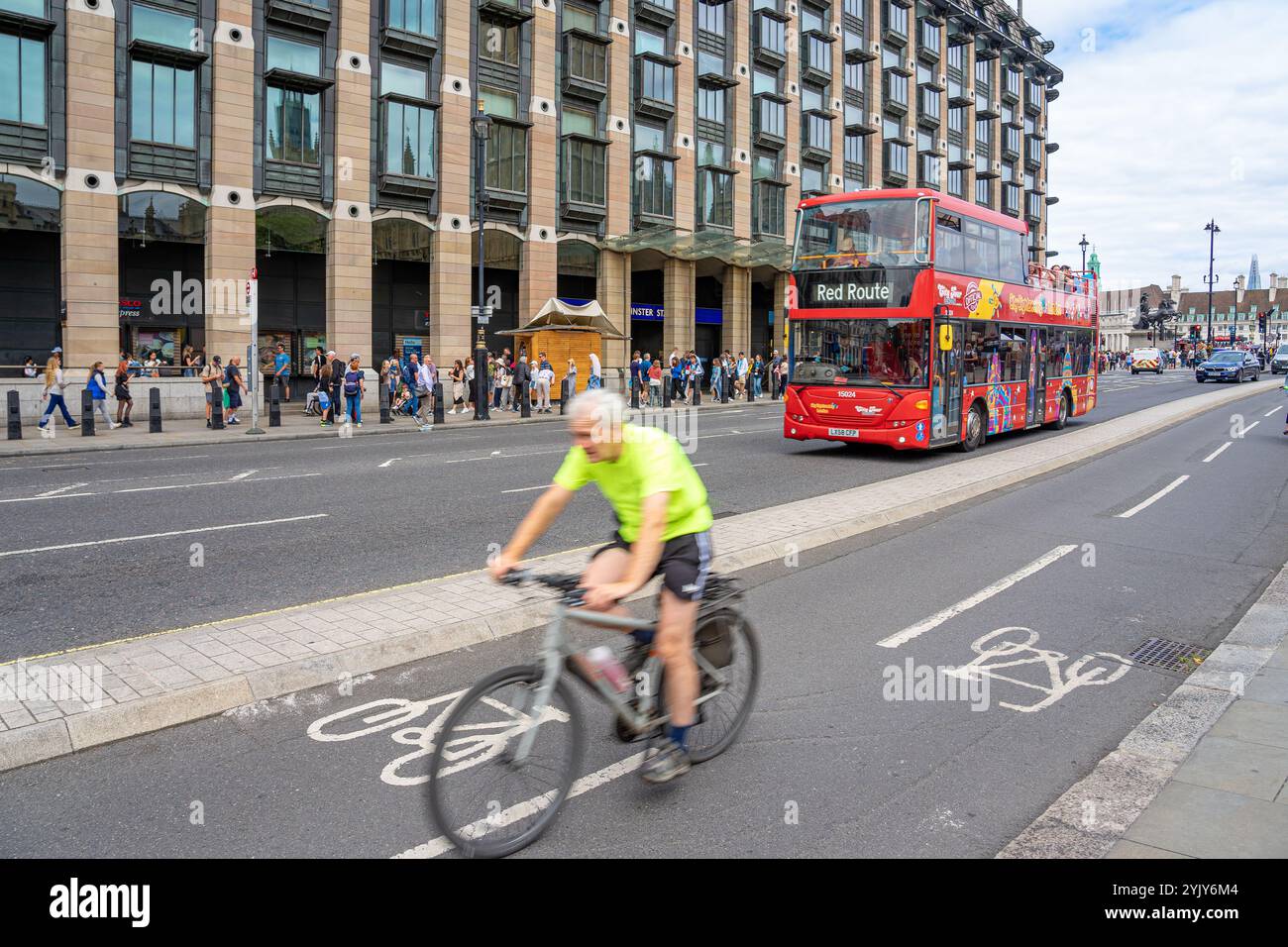 Red double-decker bus heading to Red Route, London.UK Stock Photo - Alamy