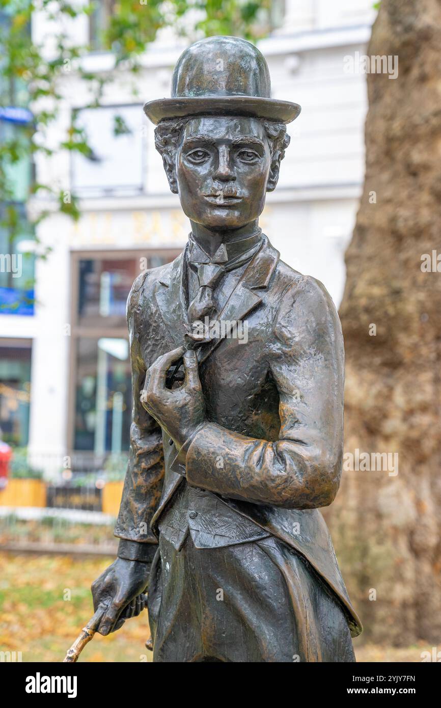 Statue in honor of Charlie Chaplin in a park in central London.UK Stock ...