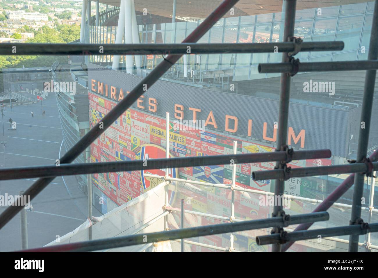 Emirates Stadium or Arsenal Stadium seen through building facade ...