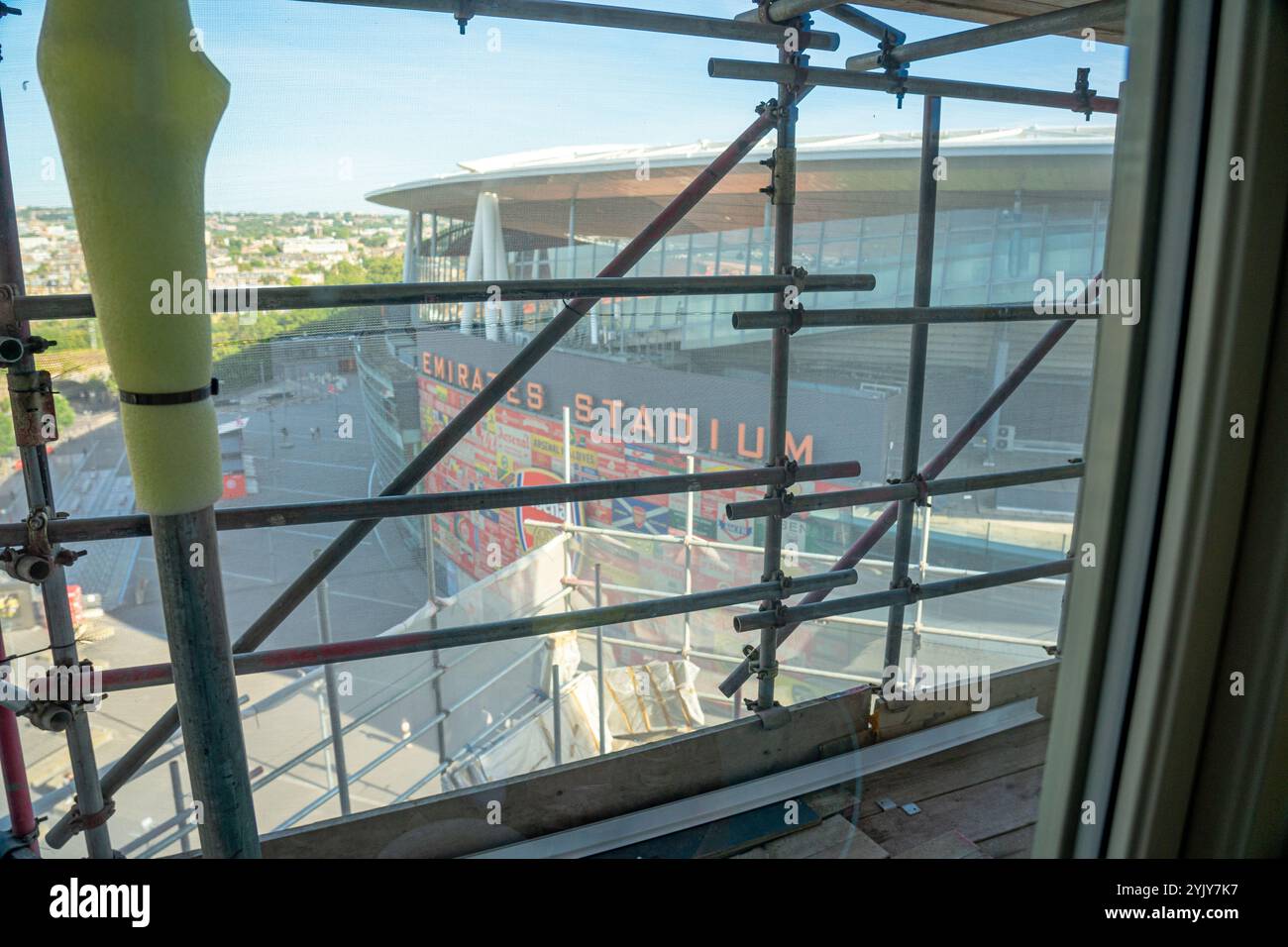 Emirates Stadium or Arsenal Stadium seen through building facade ...