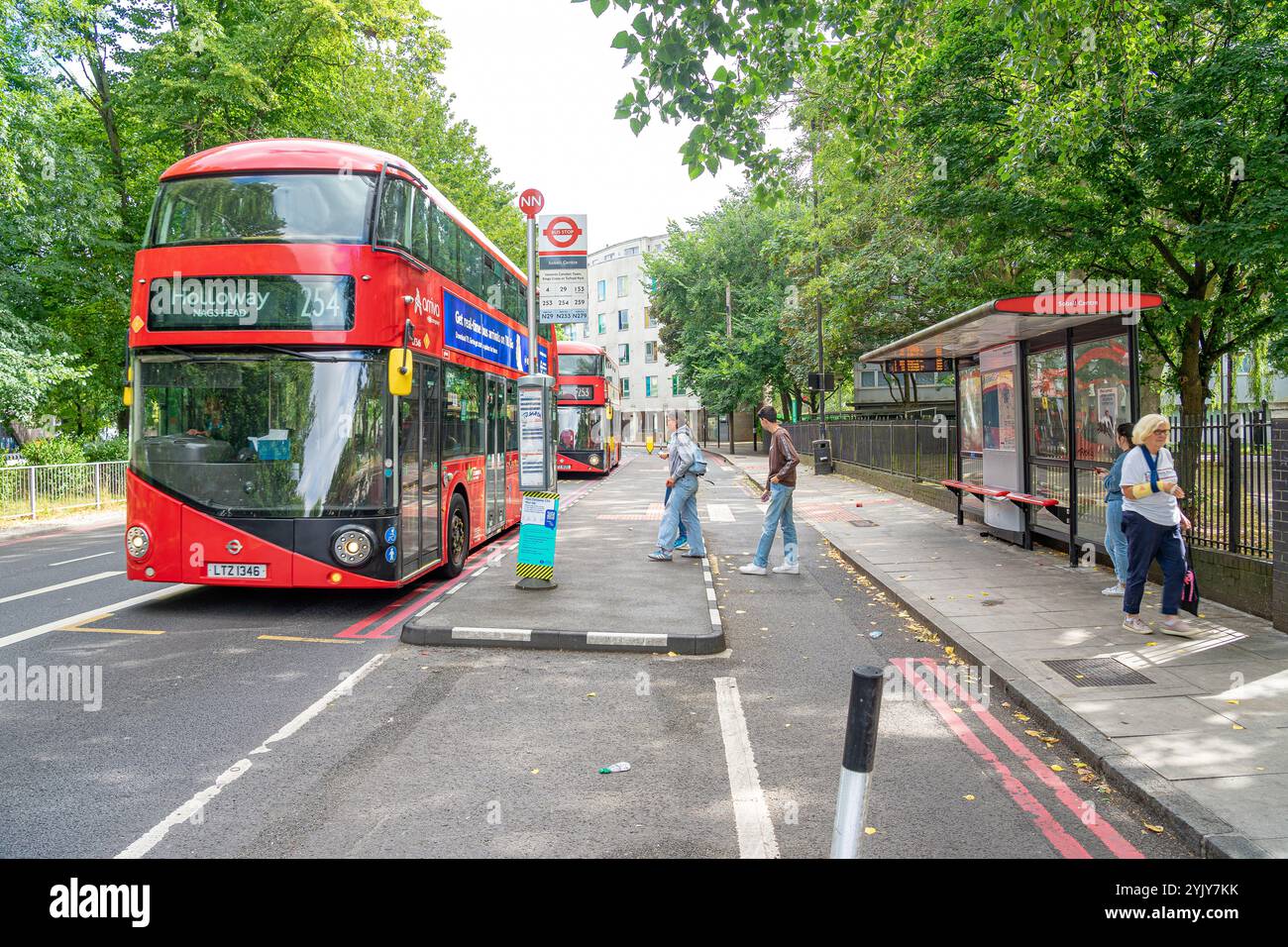 Red double-decker bus heading to Holloway, London.UK Stock Photo - Alamy