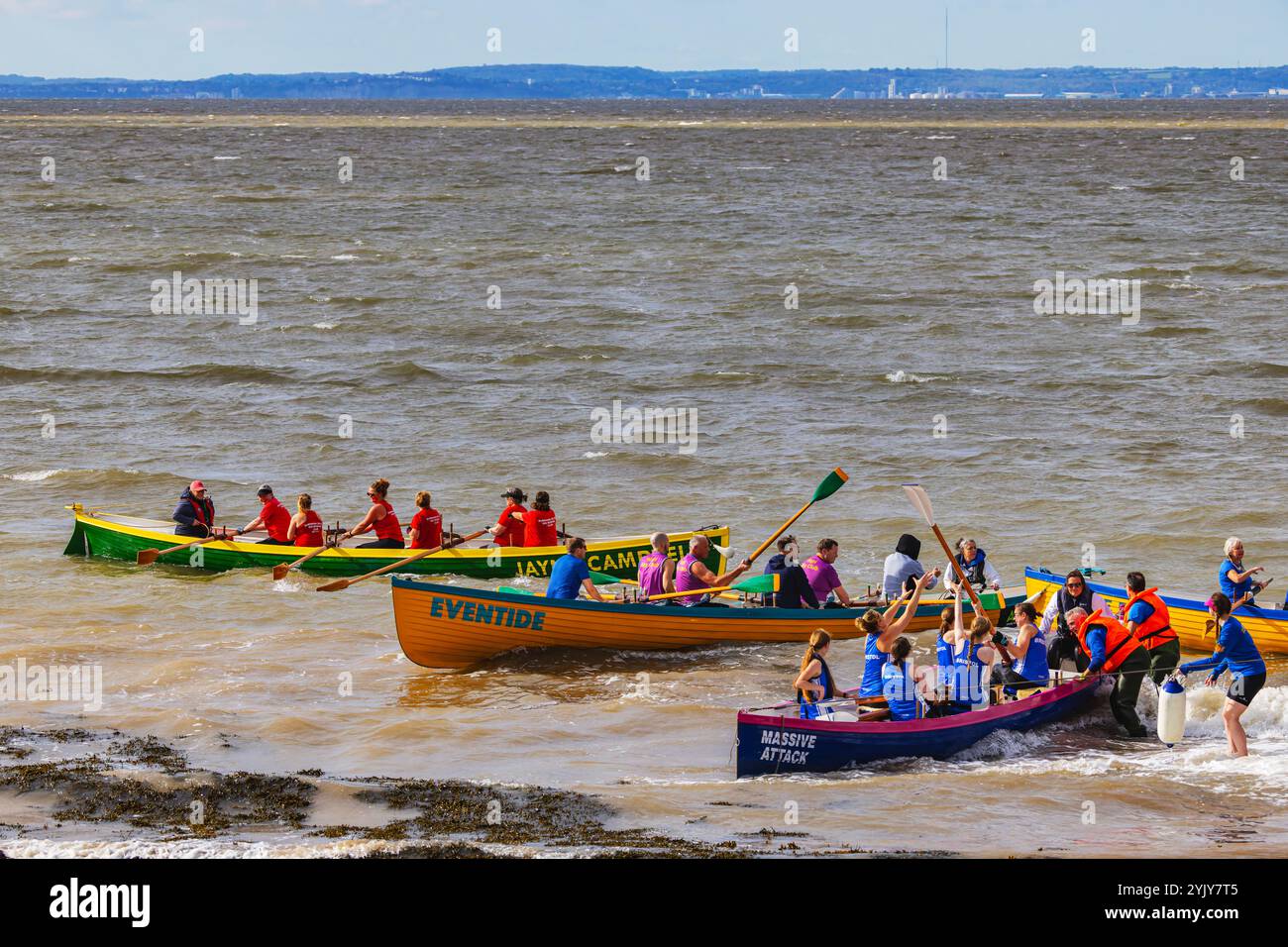 Pilot gig racing off Clevedon beach Stock Photo - Alamy