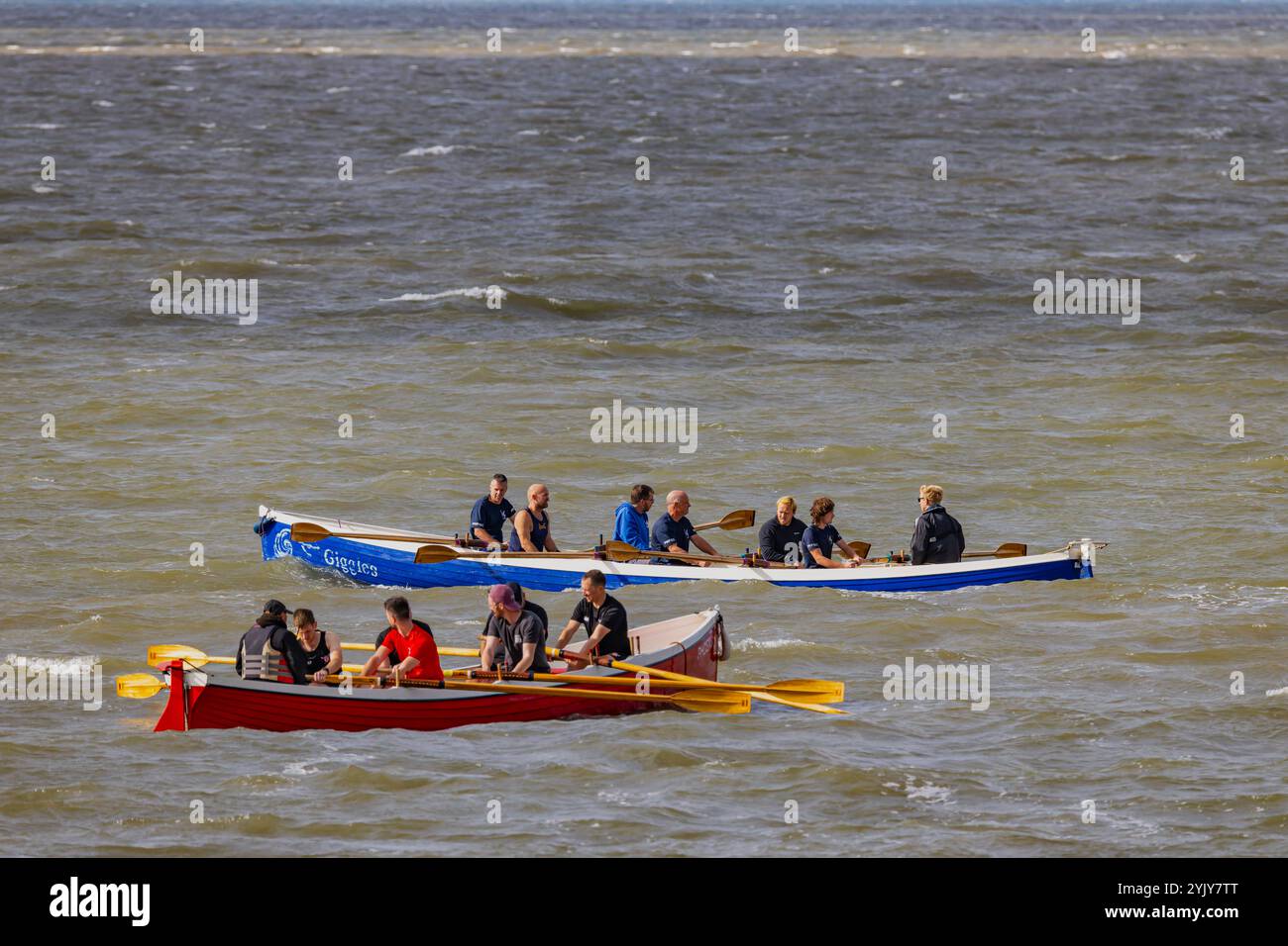 Pilot gig racing off Clevedon beach Stock Photo - Alamy
