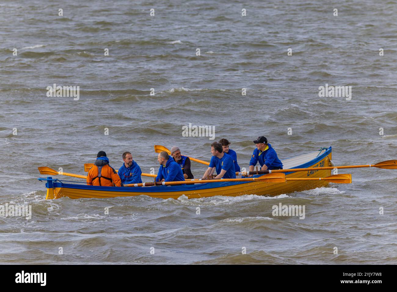 Pilot gig racing off Clevedon beach Stock Photo - Alamy