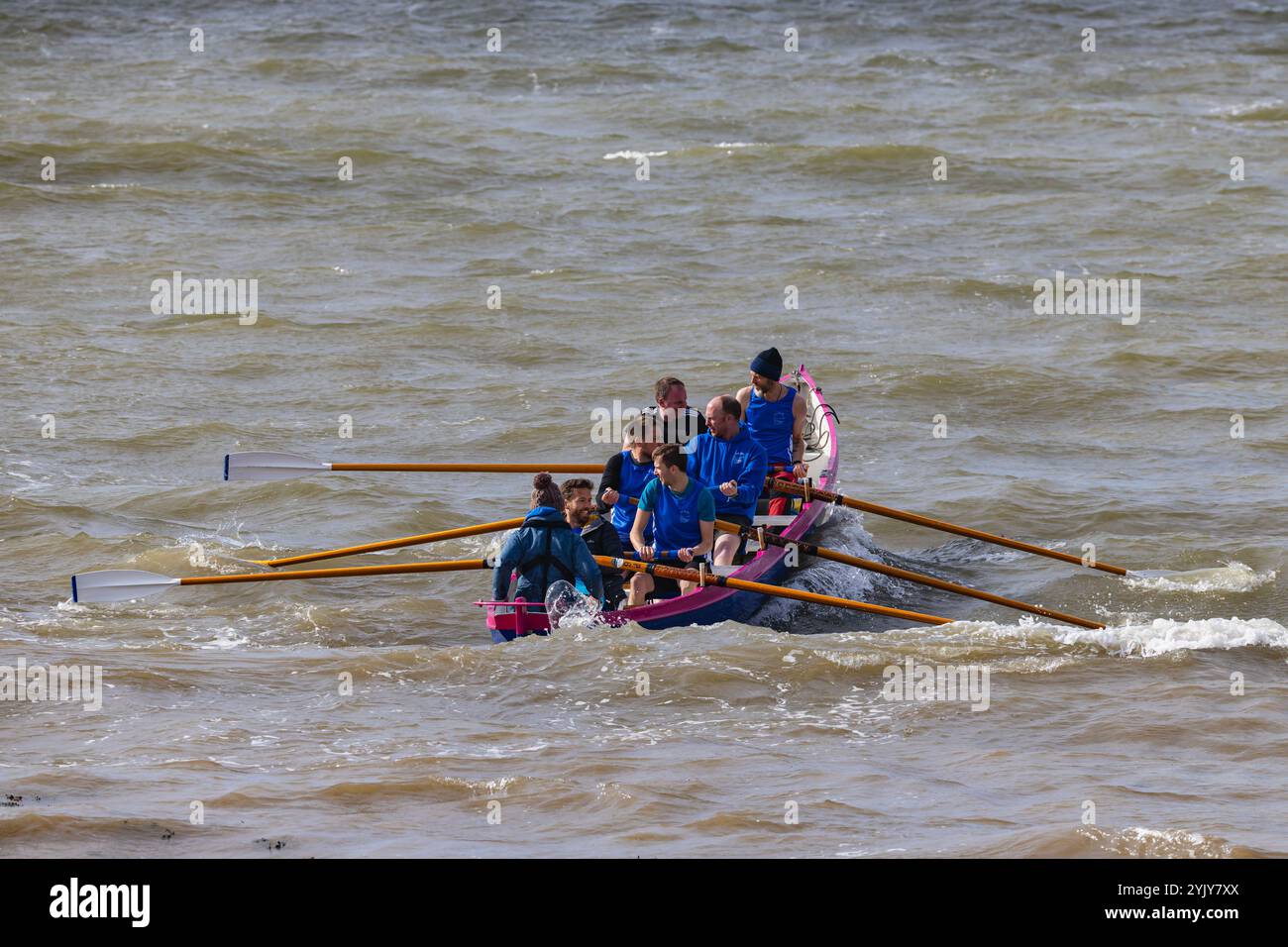 Pilot gig racing off Clevedon beach Stock Photo - Alamy