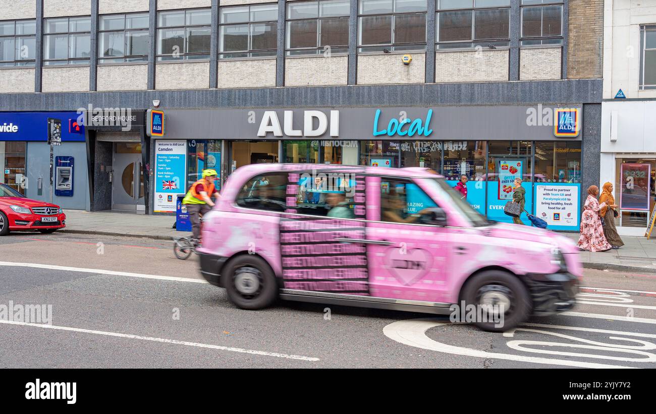 entrance facade of ALDI supermarket in the city center during the day ...