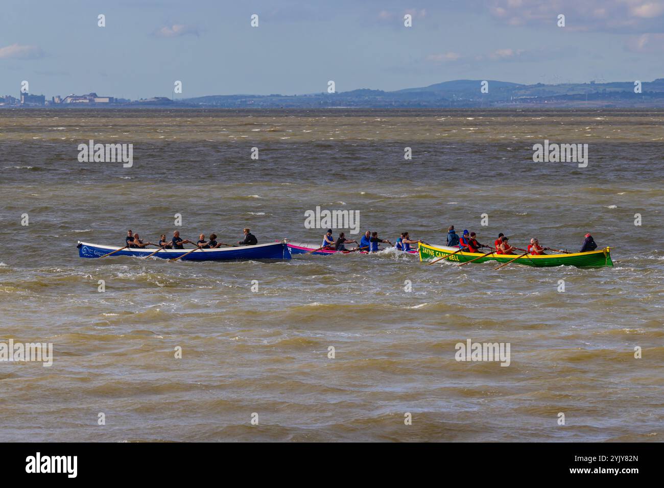 Pilot gig racing off Clevedon beach Stock Photo - Alamy