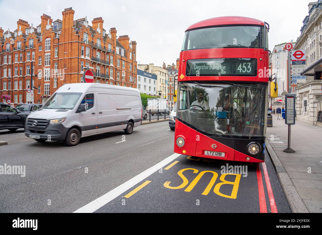 double decker bus approaching london bridge stop to drop off and pick ...