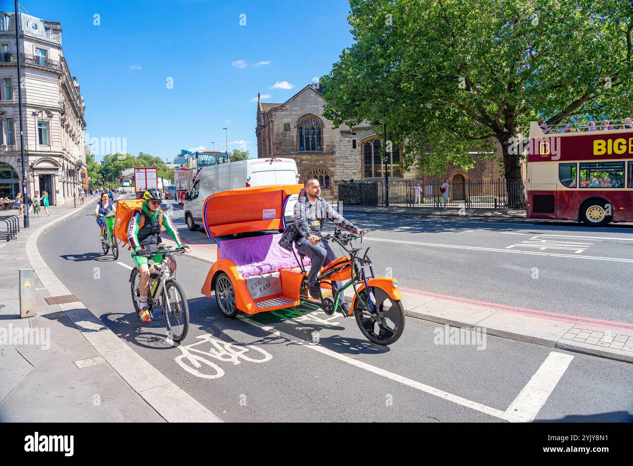 tuc tuc motor vehicle traveling in the central and tourist area of ...