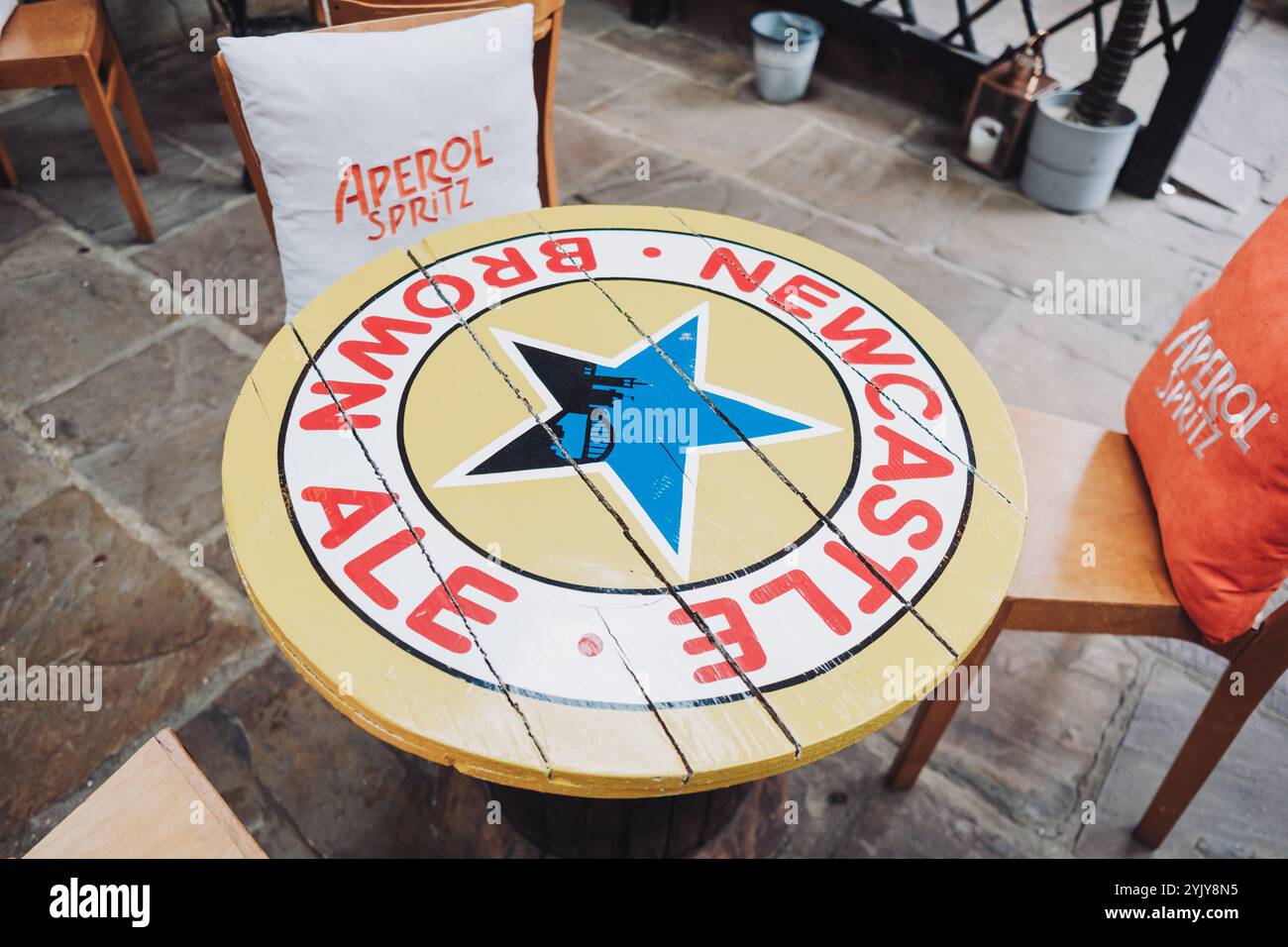 Durham UK: 6th Sept 2024: Colorful wooden table featuring a Newcastle ...