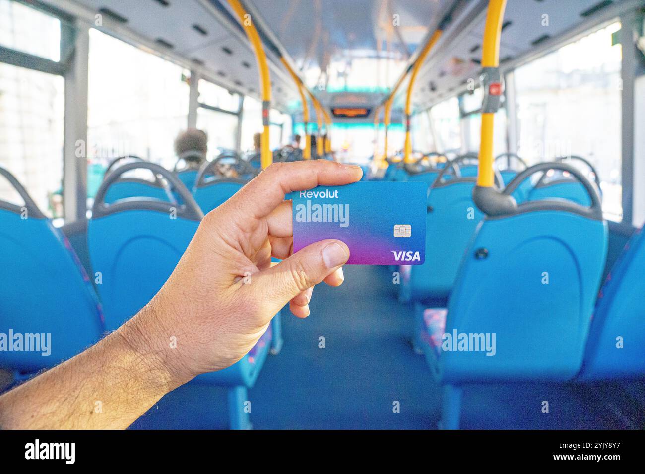 visa revolut card in hand inside the first floor passenger compartment ...