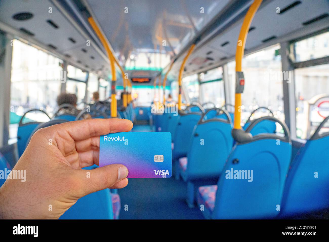 visa revolut card in hand inside the first floor passenger compartment ...