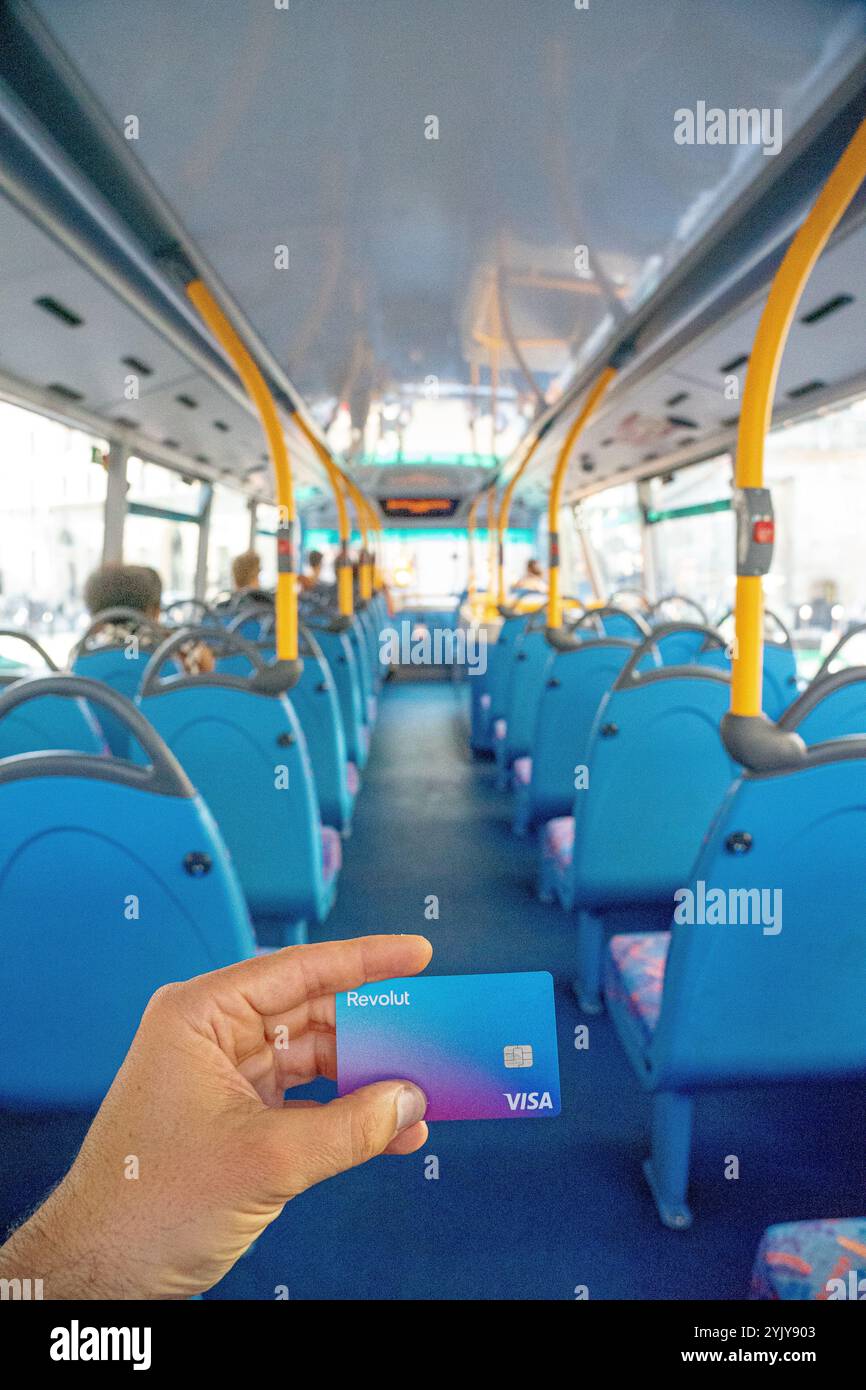 visa revolut card in hand inside the first floor passenger compartment ...