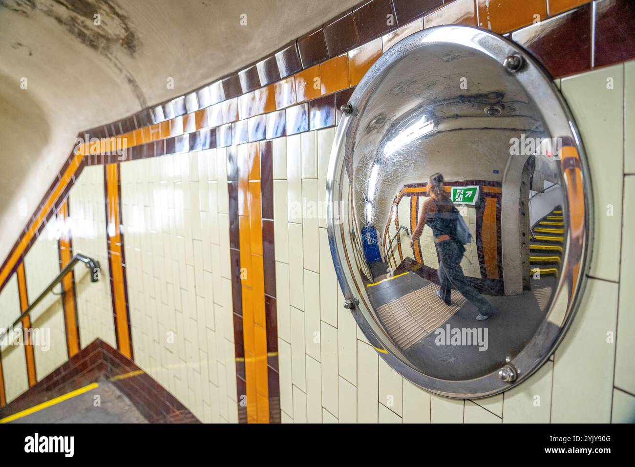 round mirror for pedestrian traffic inside a Piccadilly line tube ...