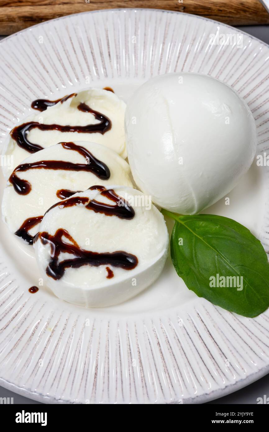 Tasty italian food, fresh white buffalo milk mozzarella soft cheese ...