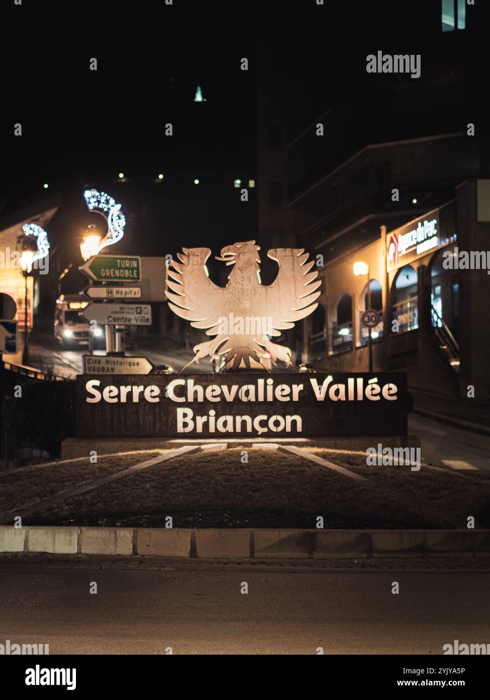 Nighttime scene in Briançon, France, featuring the Serre Chevalier ...