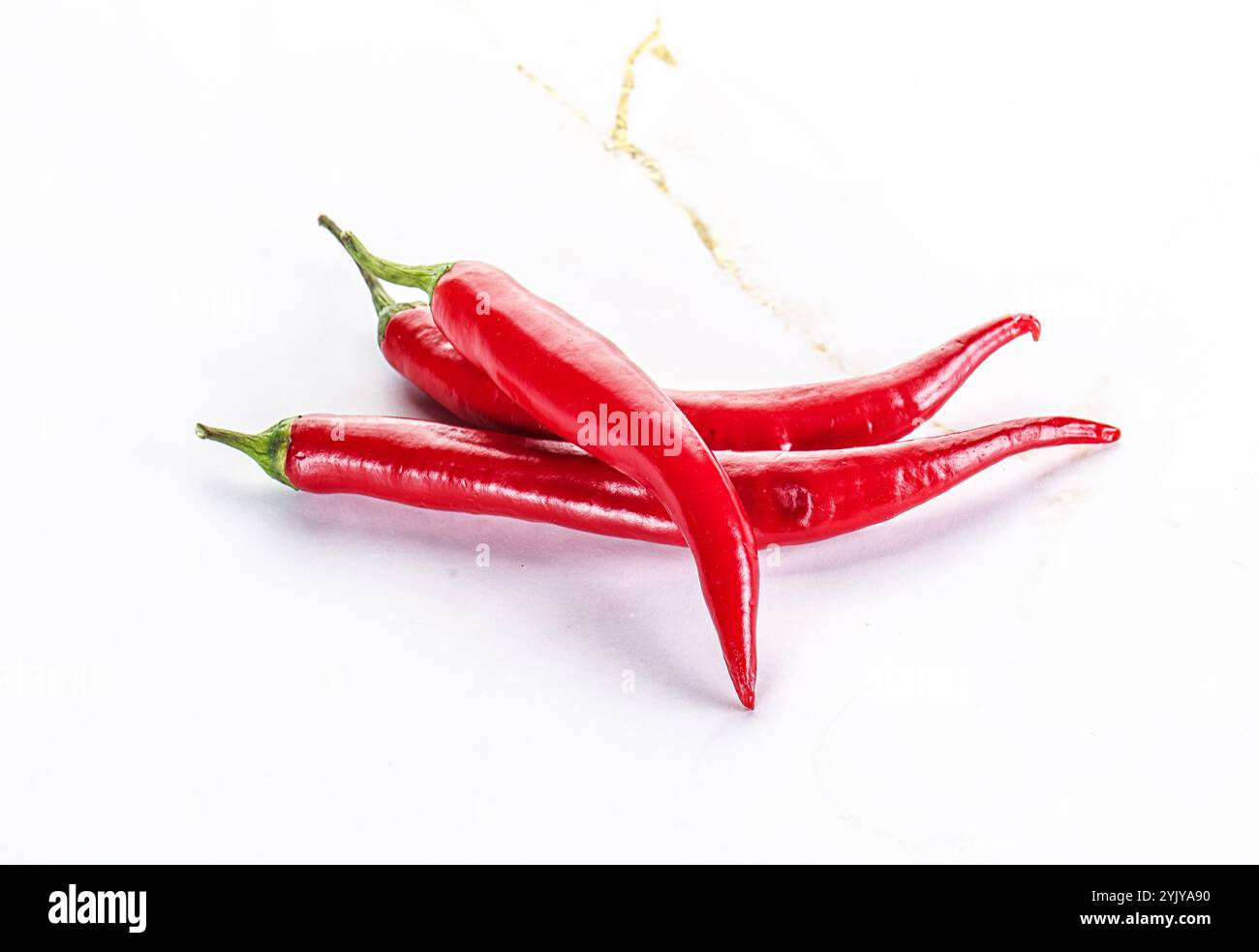 Hot and spicy chili pepper heap Stock Photo - Alamy