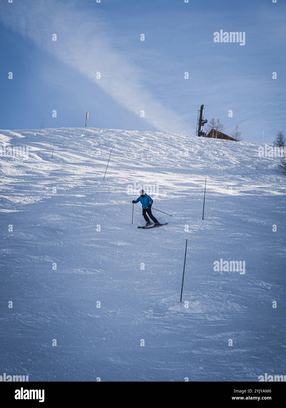 A skier descends a challenging black route at Serre Chevalier Ski ...