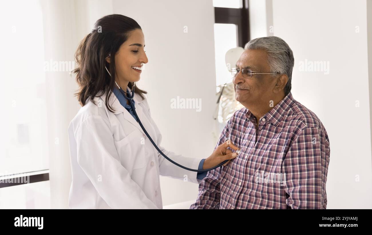 Indian doctor checks man hi-res stock photography and images - Alamy