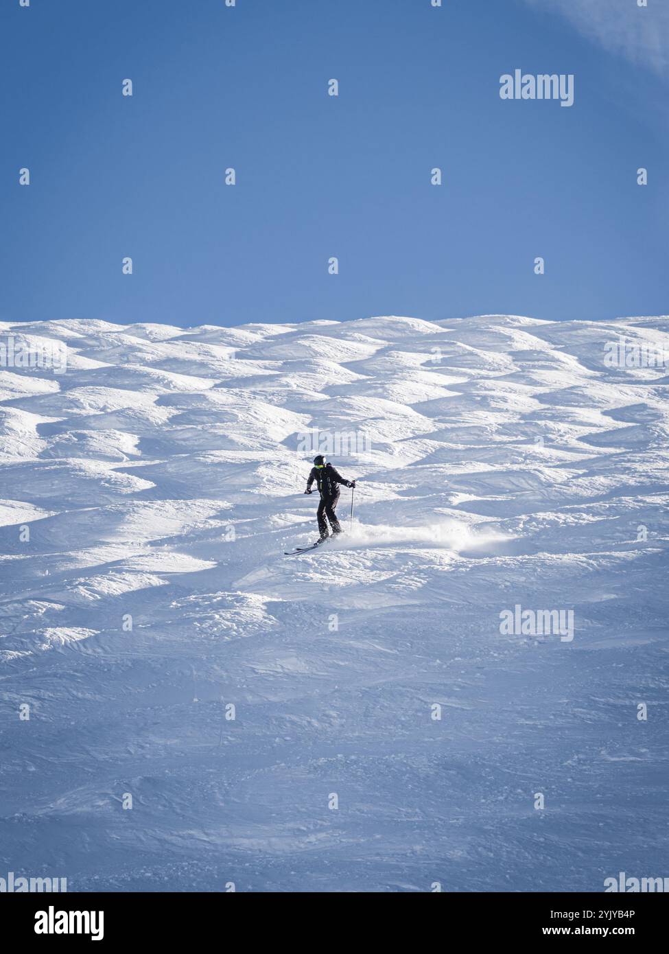 Downhill skier in black hi-res stock photography and images - Alamy