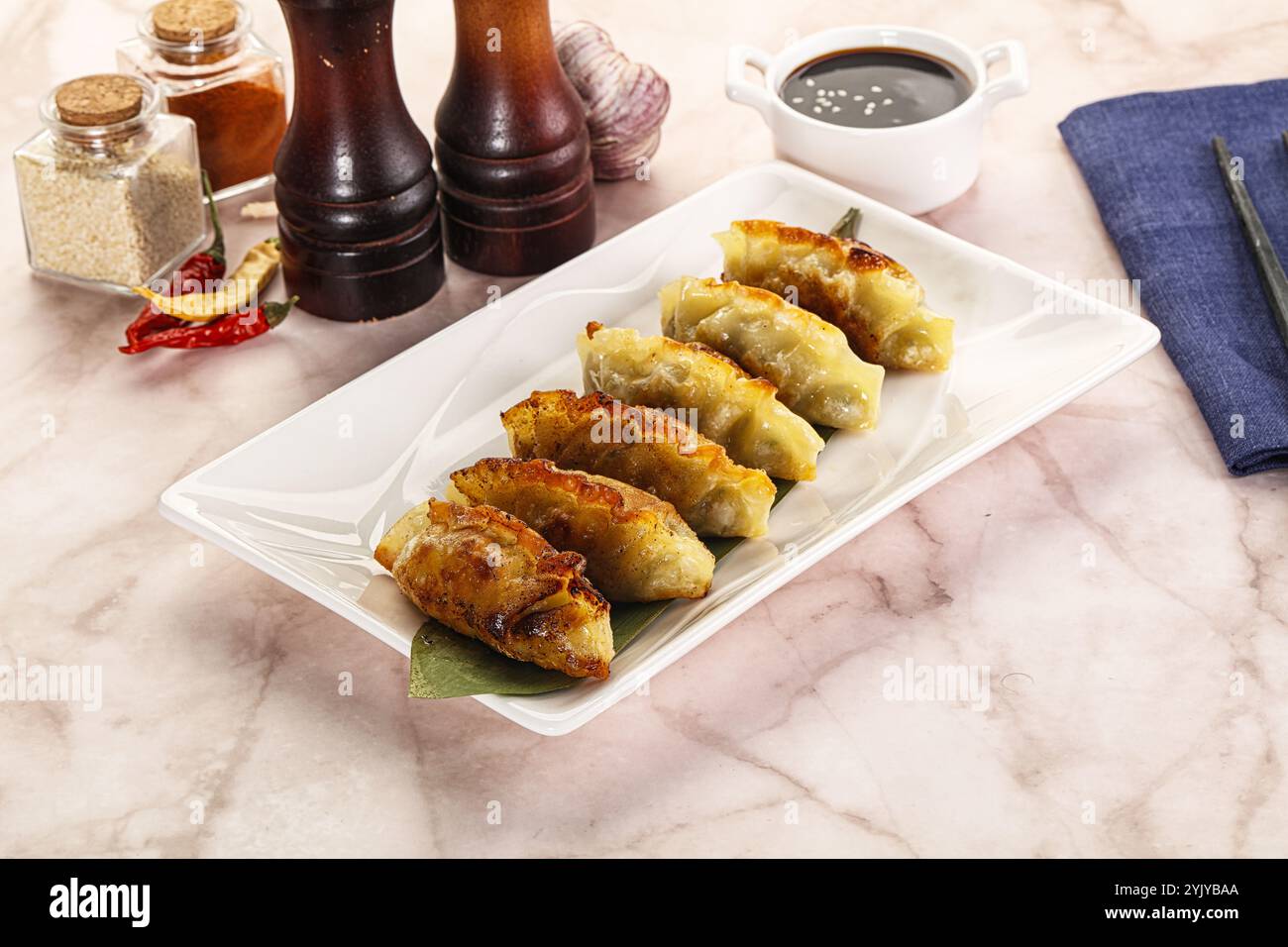 Fried Japanese stuffed dumplings - Gyoza with meat Stock Photo - Alamy