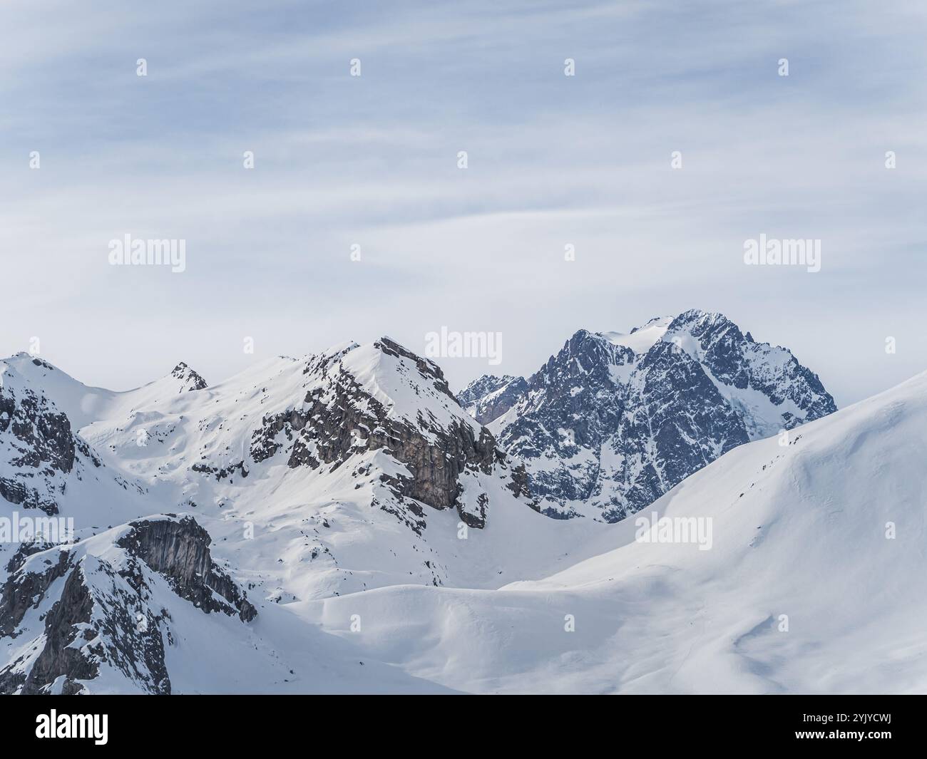 Snow-covered peaks of the Serre Chevalier ski resort near Briançon ...