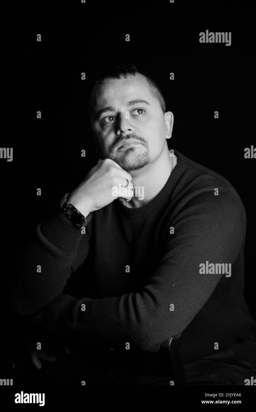 Thoughtful lighting Black and White Stock Photos & Images - Alamy