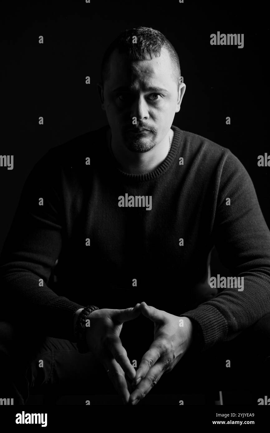 Introspective Portrait of a Man in Low-Key Lighting Stock Photo - Alamy