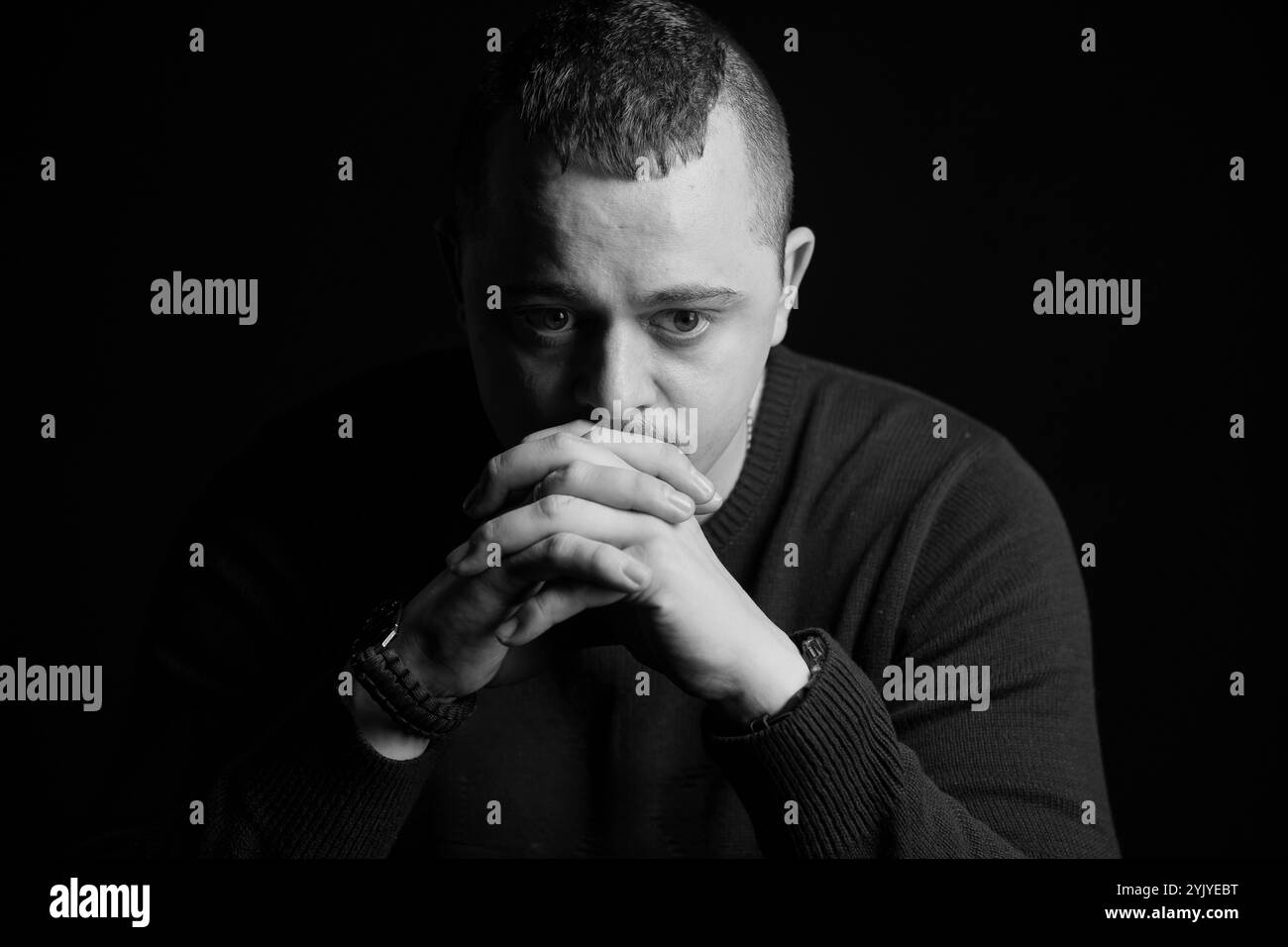 Introspective Man in Black and White Portrait Stock Photo - Alamy