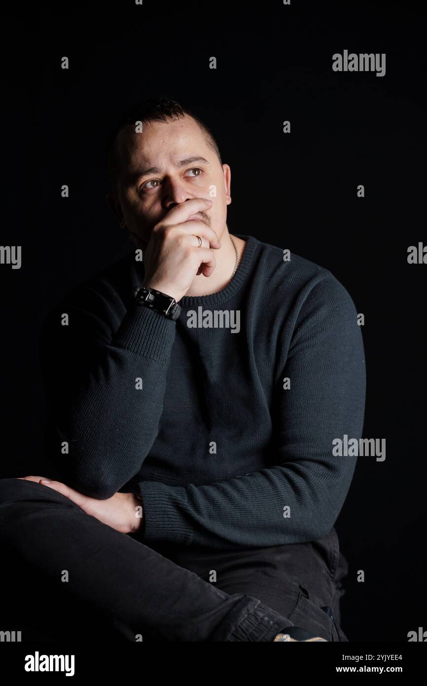 Low key portrait pensive hi-res stock photography and images - Alamy