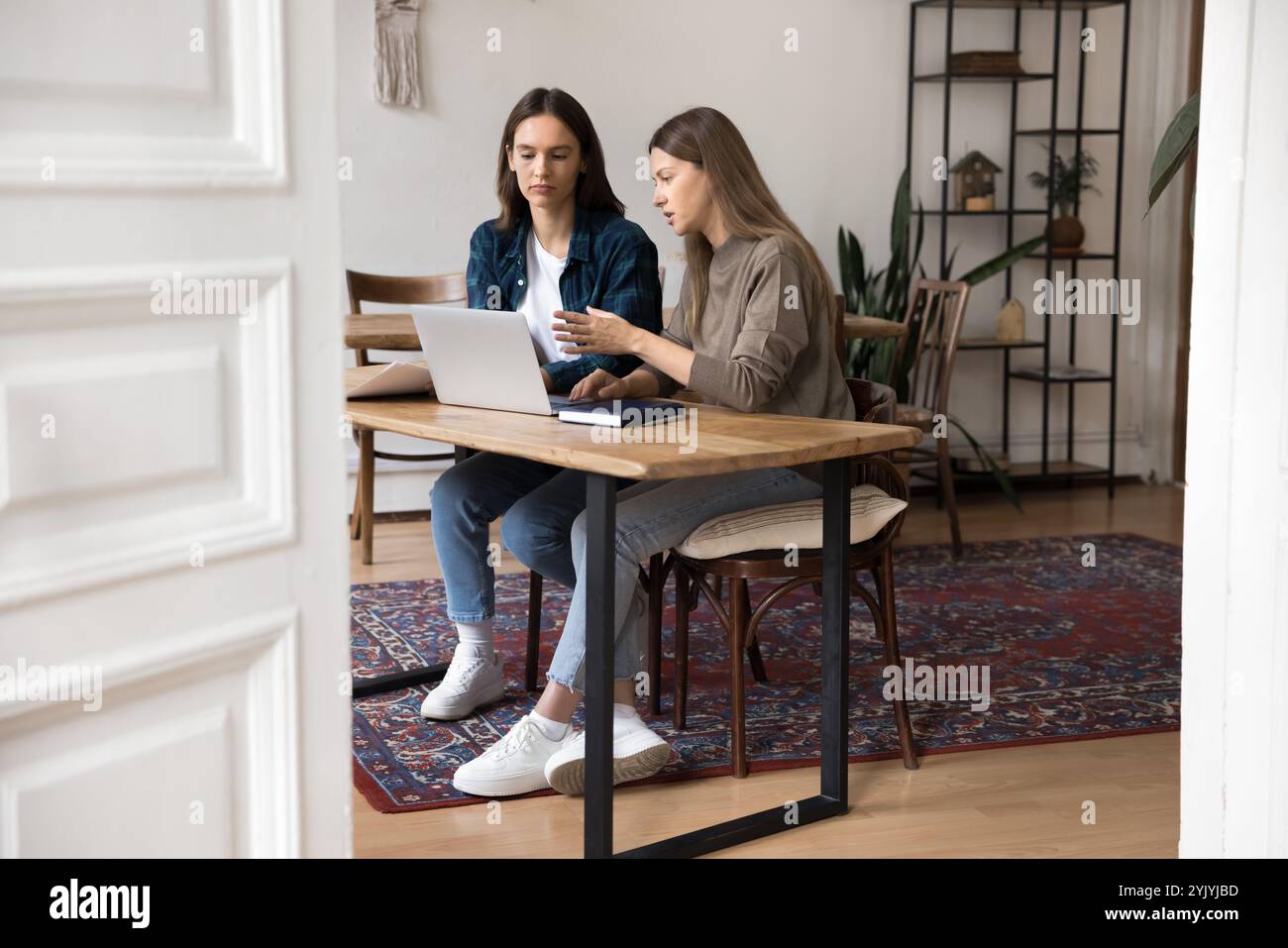 Two businesswomen discussing ideas using hi-res stock photography and ...