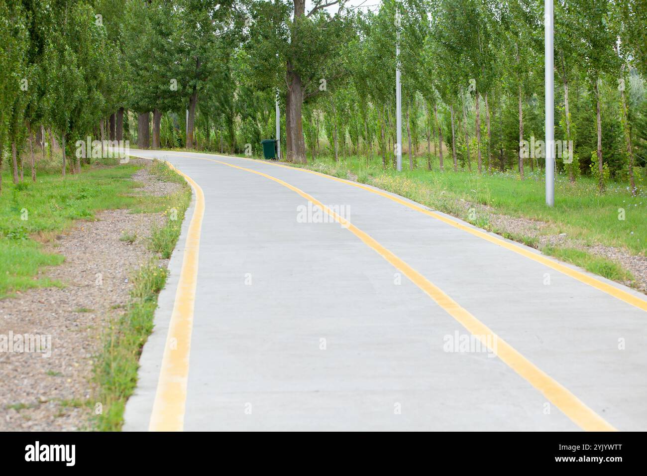 Bicycle and pedestrian path around Lake Lisi, Tbilisi Stock Photo - Alamy
