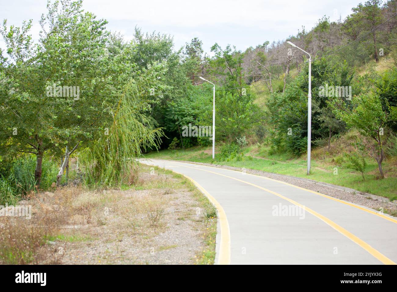 Bicycle and pedestrian path around Lake Lisi, Tbilisi Stock Photo - Alamy