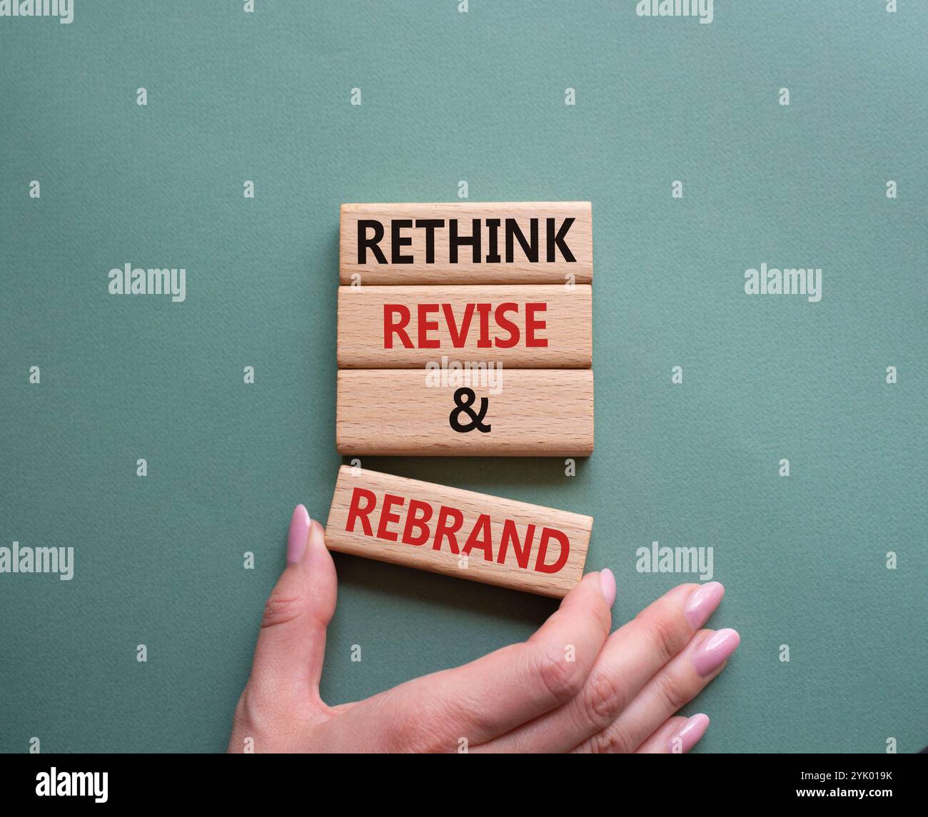 Rethink Revise and Rebrand symbol. Wooden blocks with words Rethink ...