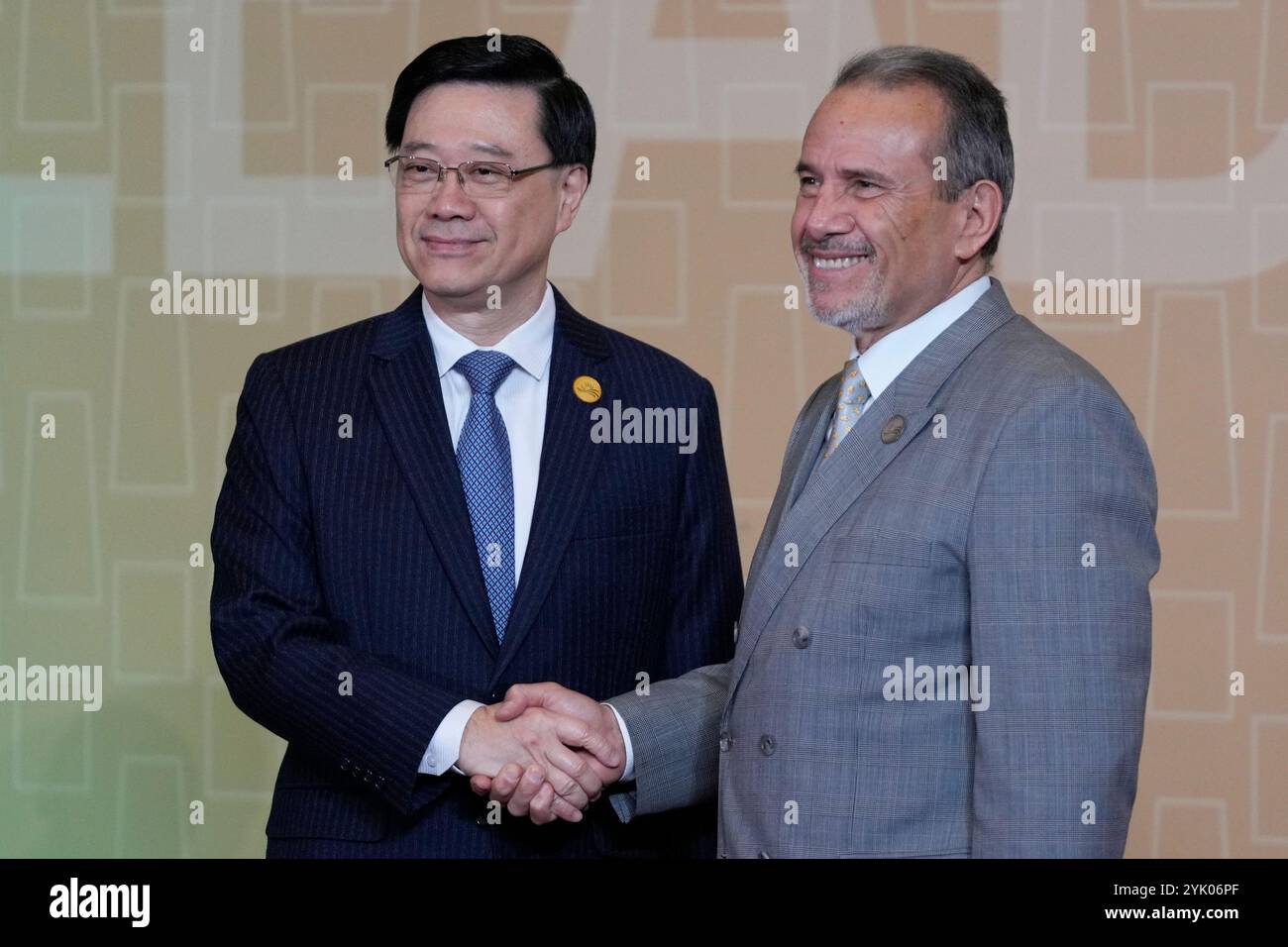 Peru's Foreign Affairs Minister Elmer Schialer, right, welcomes Hong ...