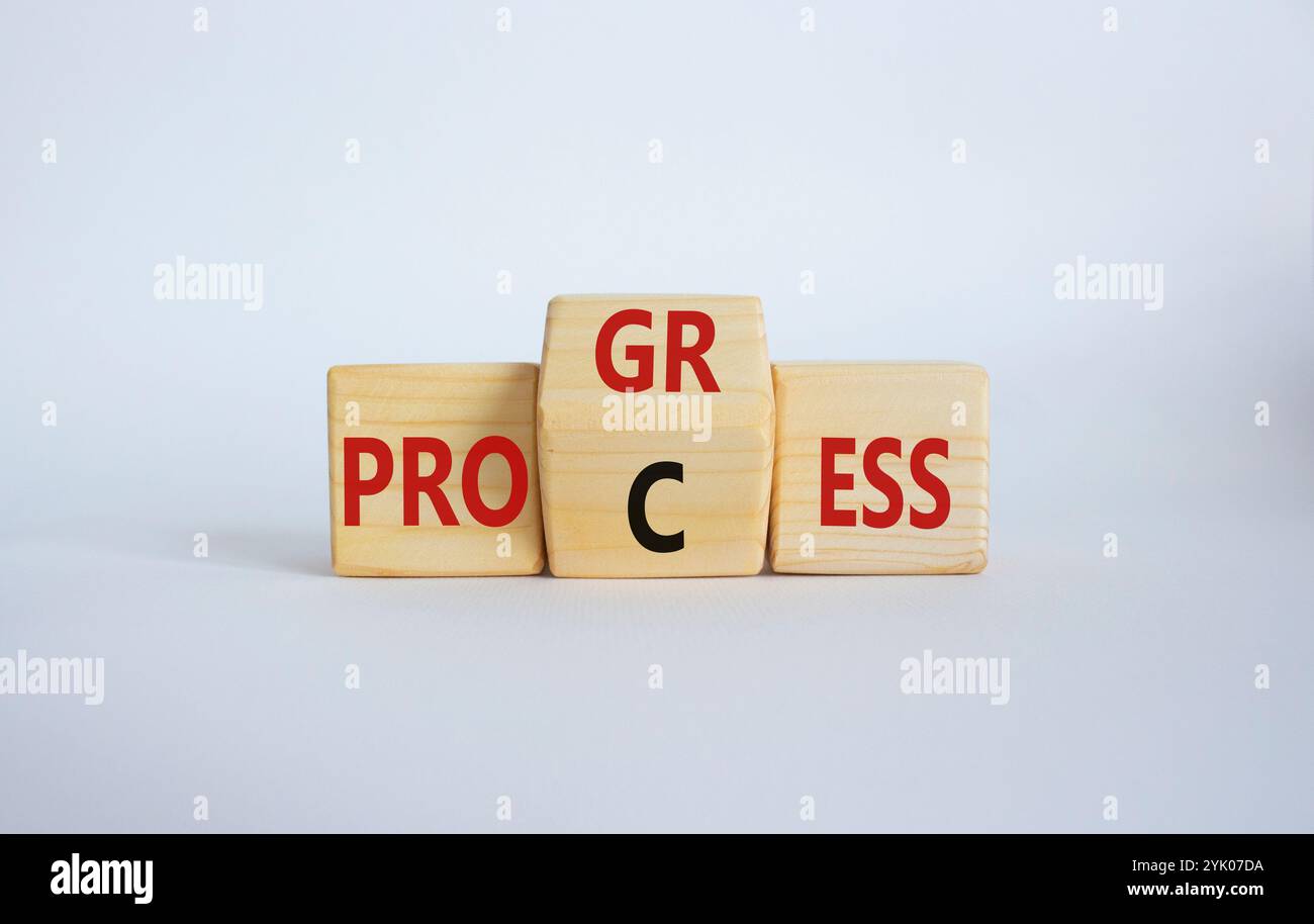 Process and Progress symbol. Wooden cubes with words Process and ...