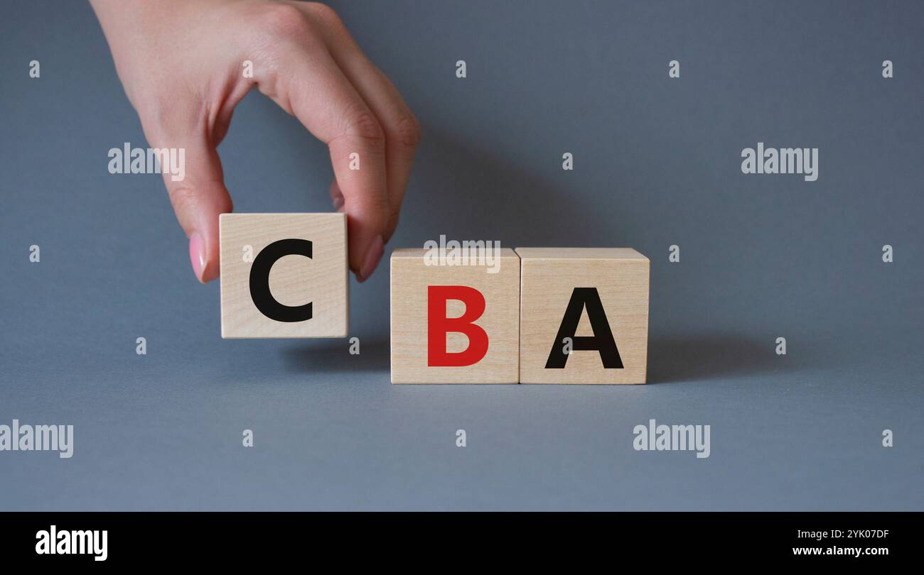 CBA - Cost Benefit Analysis symbol. Wooden cubes with word CBA ...