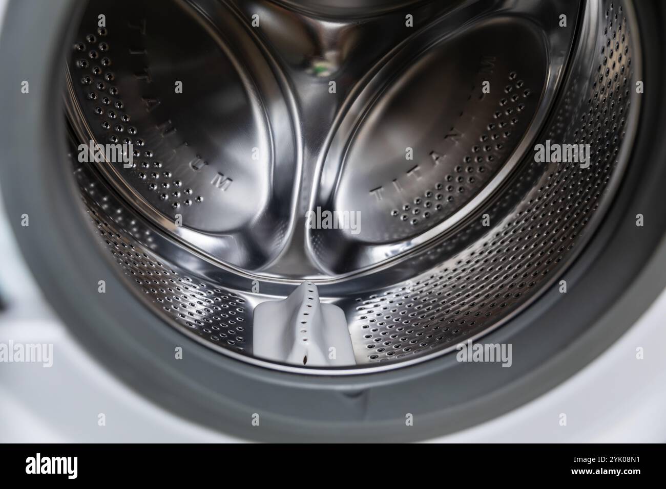The interior of a modern washing machine drum highlights advanced ...