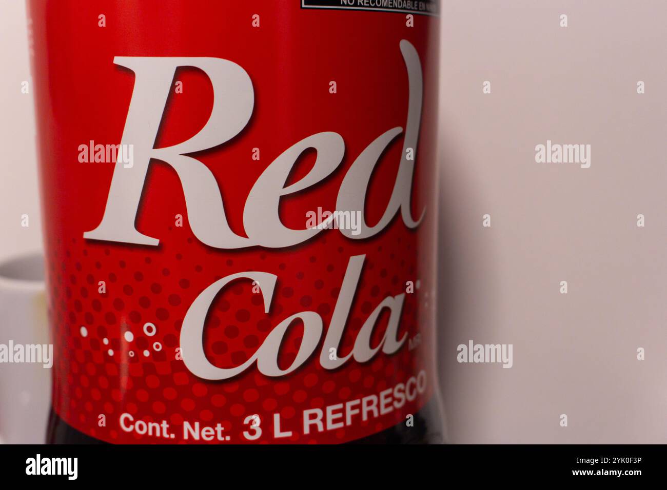 A detailed close-up of a Red Cola bottle label. Red Cola is a ...