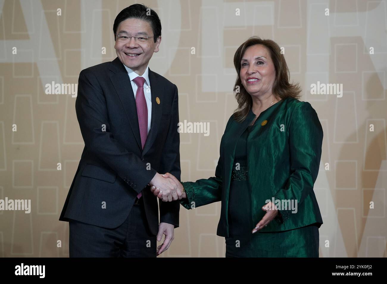 Peru's President Dina Boluarte, right, welcomes Singapore's Prime ...