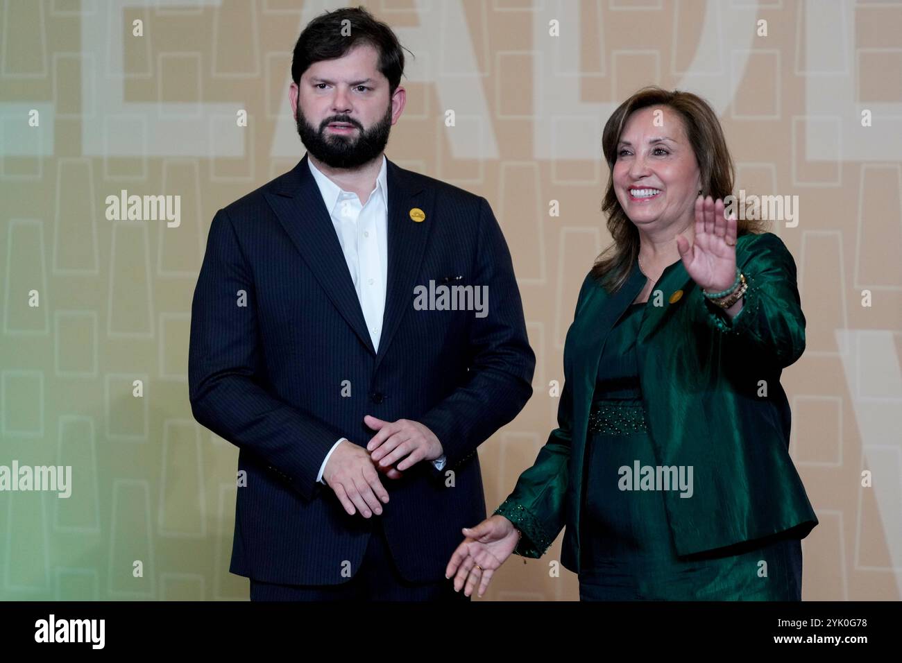 Peru's President Dina Boluarte, right, welcomes Chile's President ...