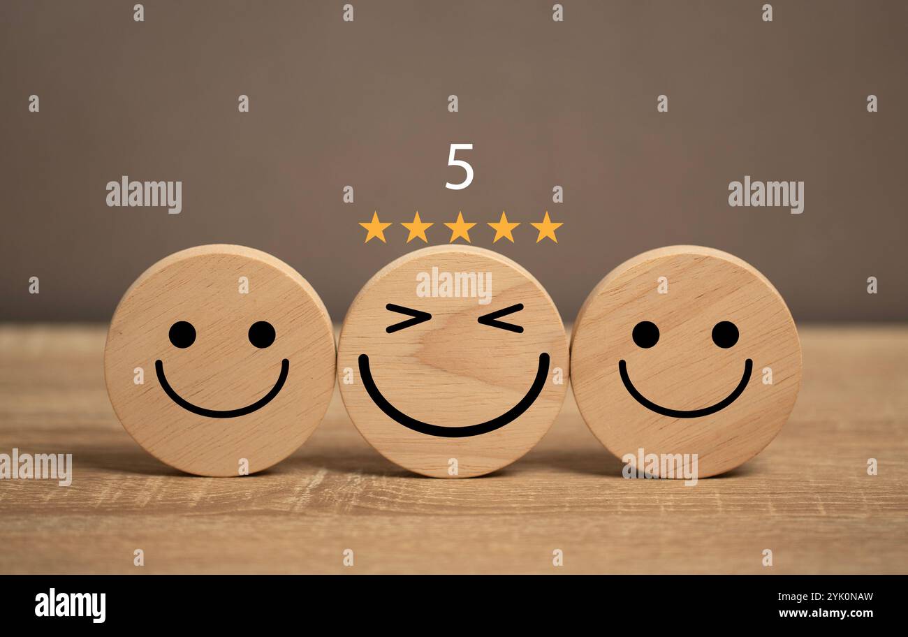 Smile icon showing 5 stars satisfaction in service on the table. Survey ...