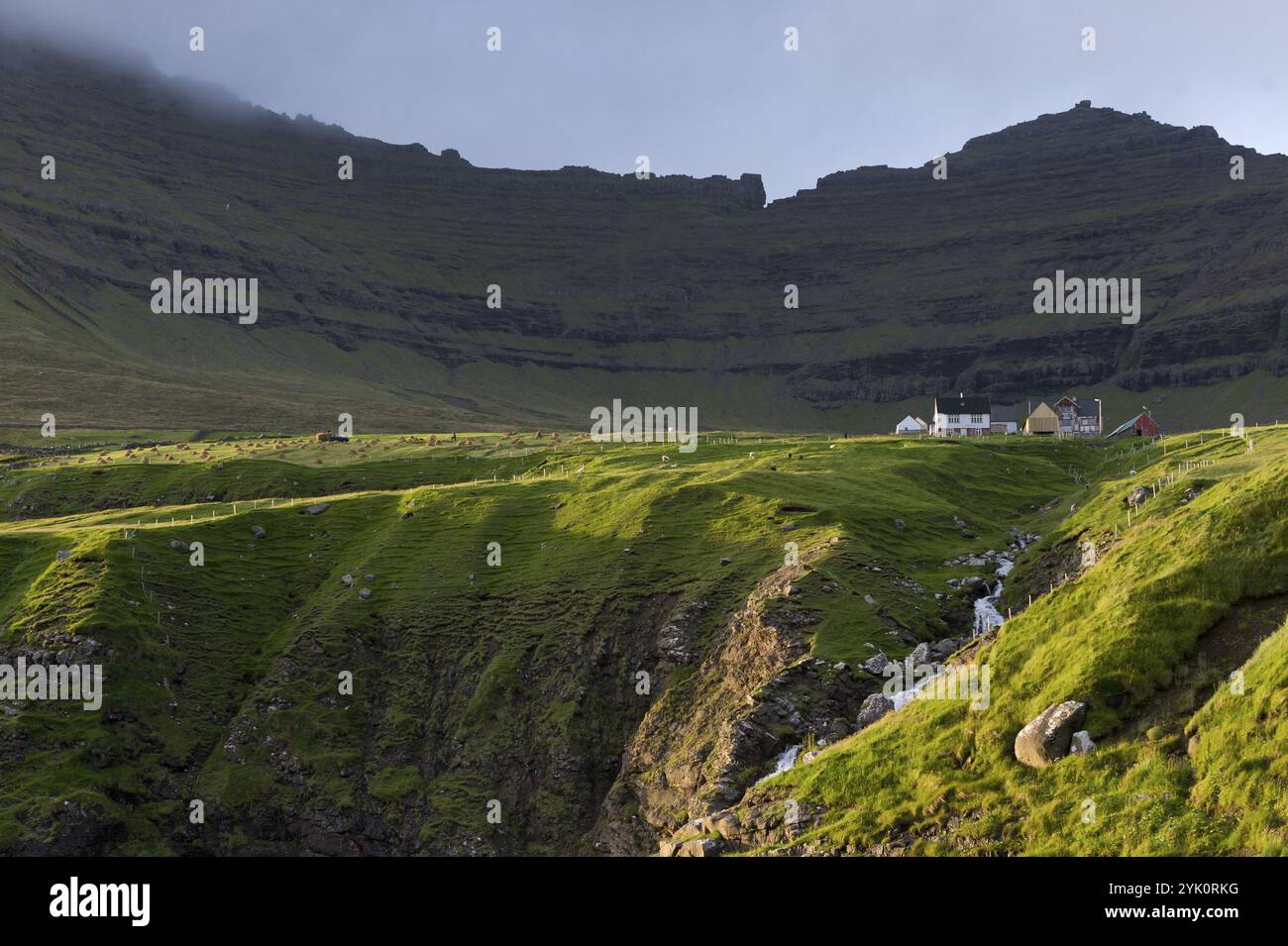 Houses in front of a mountain backdrop, Vidareidi, Vidoy Island, ViÃ ...