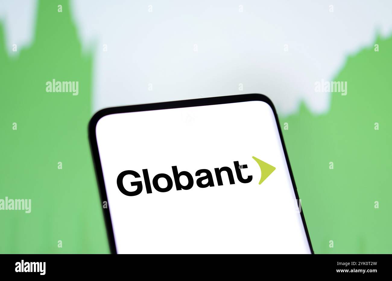 Globant logo is displayed on smartphone. Globant is an IT and software ...