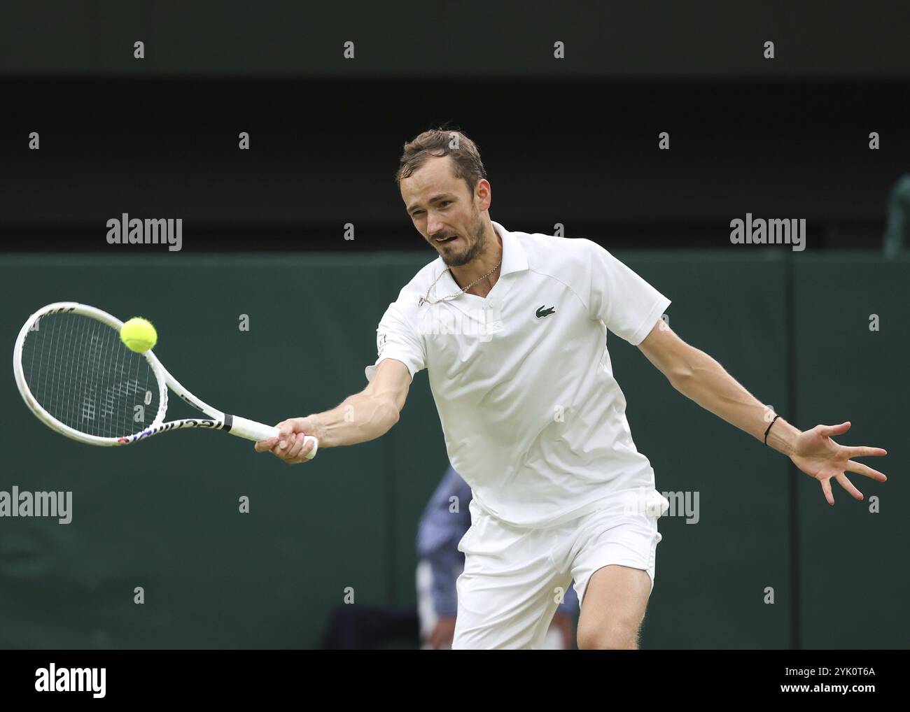 Russian tennis player Daniil Medvedev in action at the 2024 Wimbledon ...