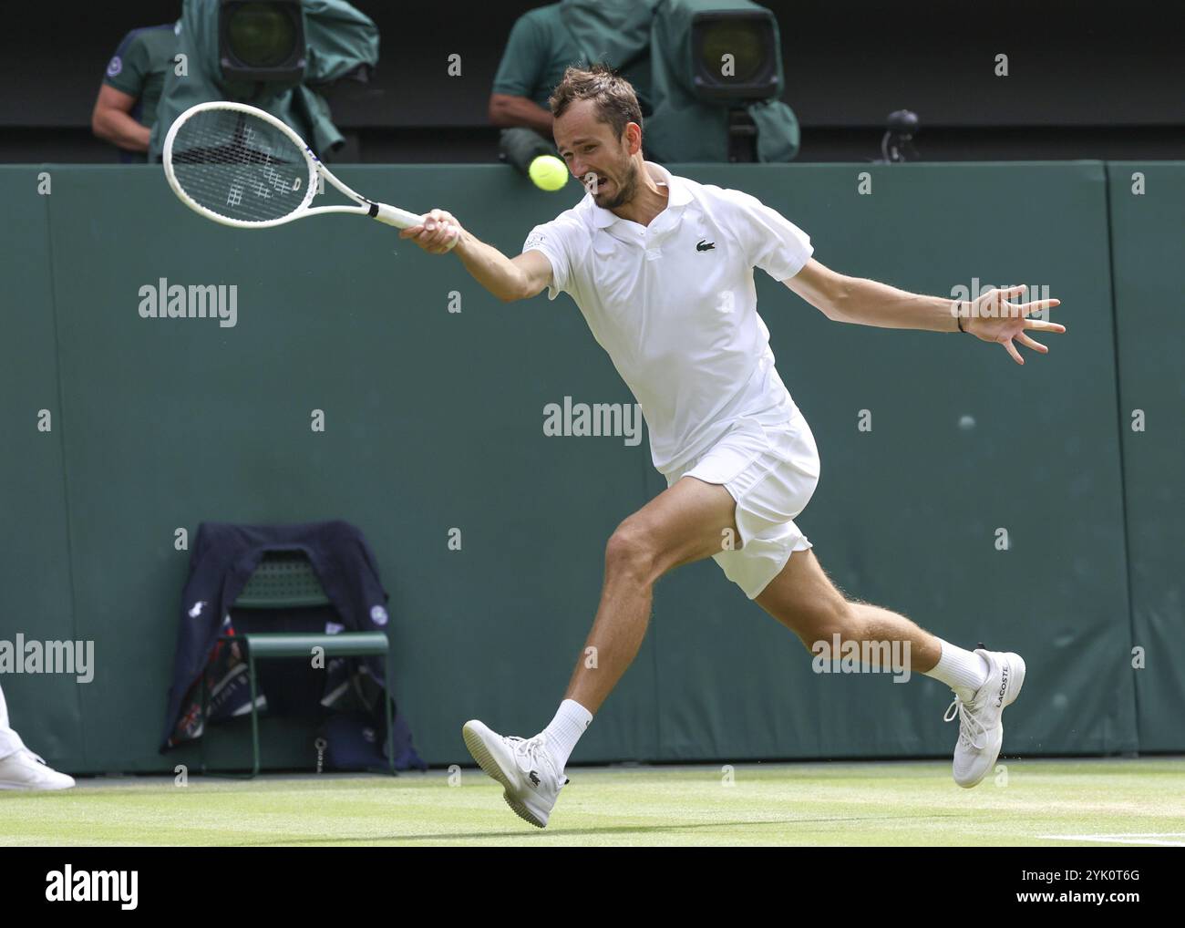 Russian tennis player Daniil Medvedev in action at the 2024 Wimbledon ...