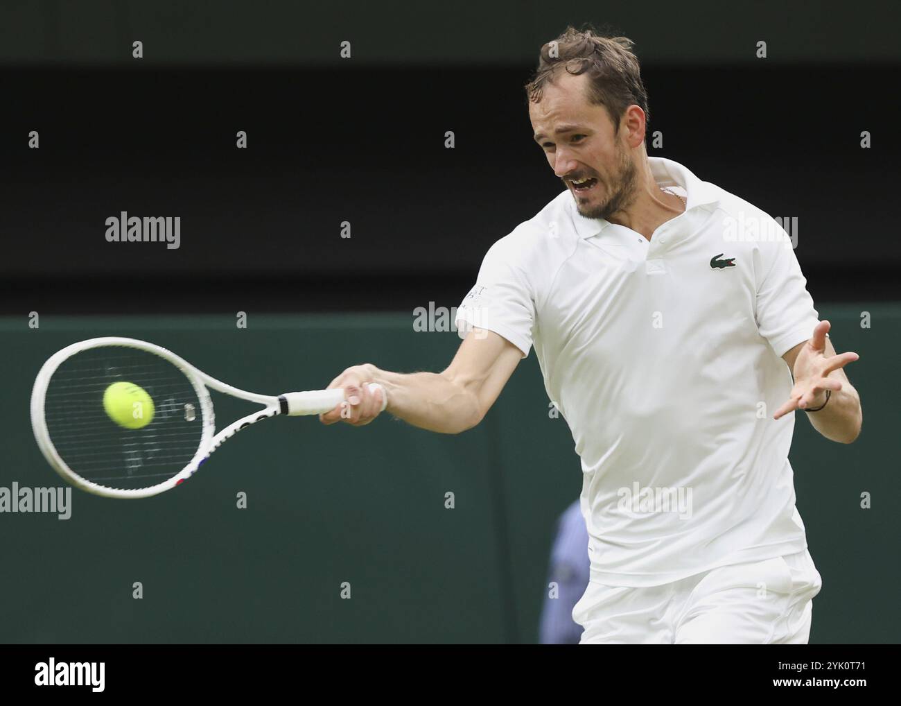 Russian tennis player Daniil Medvedev in action at the 2024 Wimbledon ...