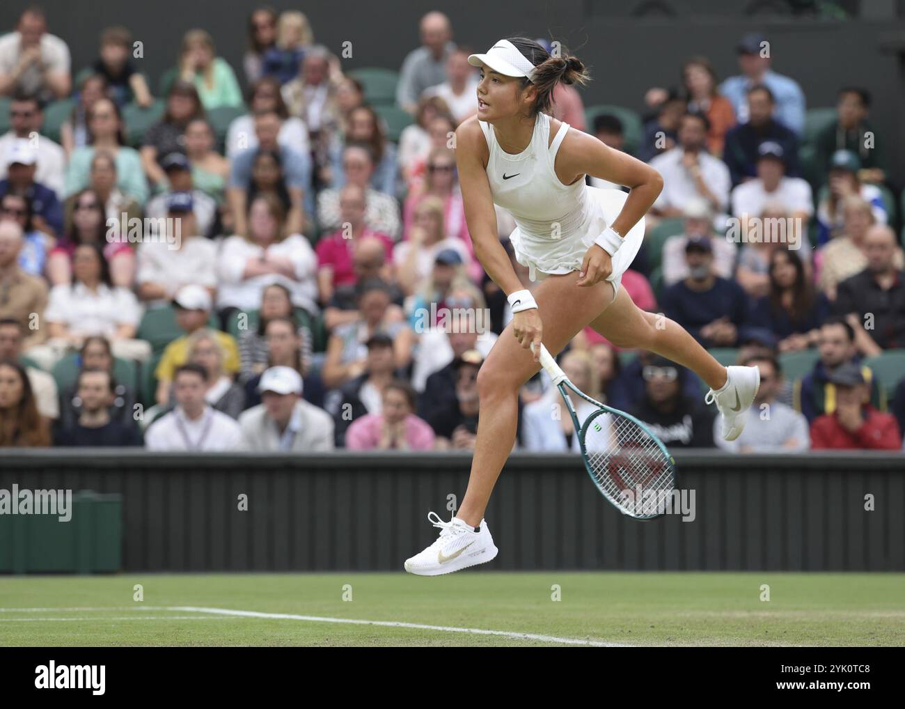 British tennis player Emma Raducanu in action at the 2024 Wimbledon Championships, London ...